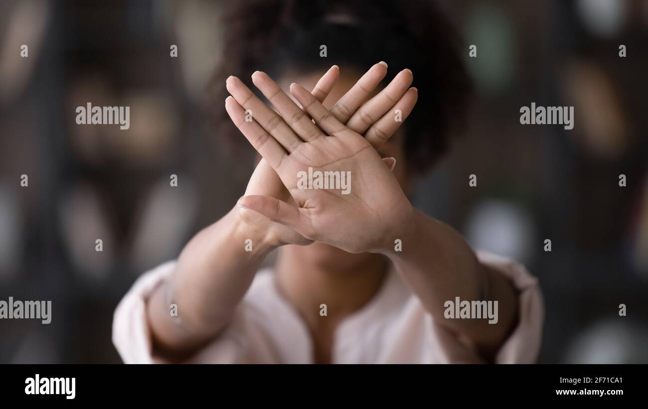 African American woman show hand gesture protest against discrimination ...