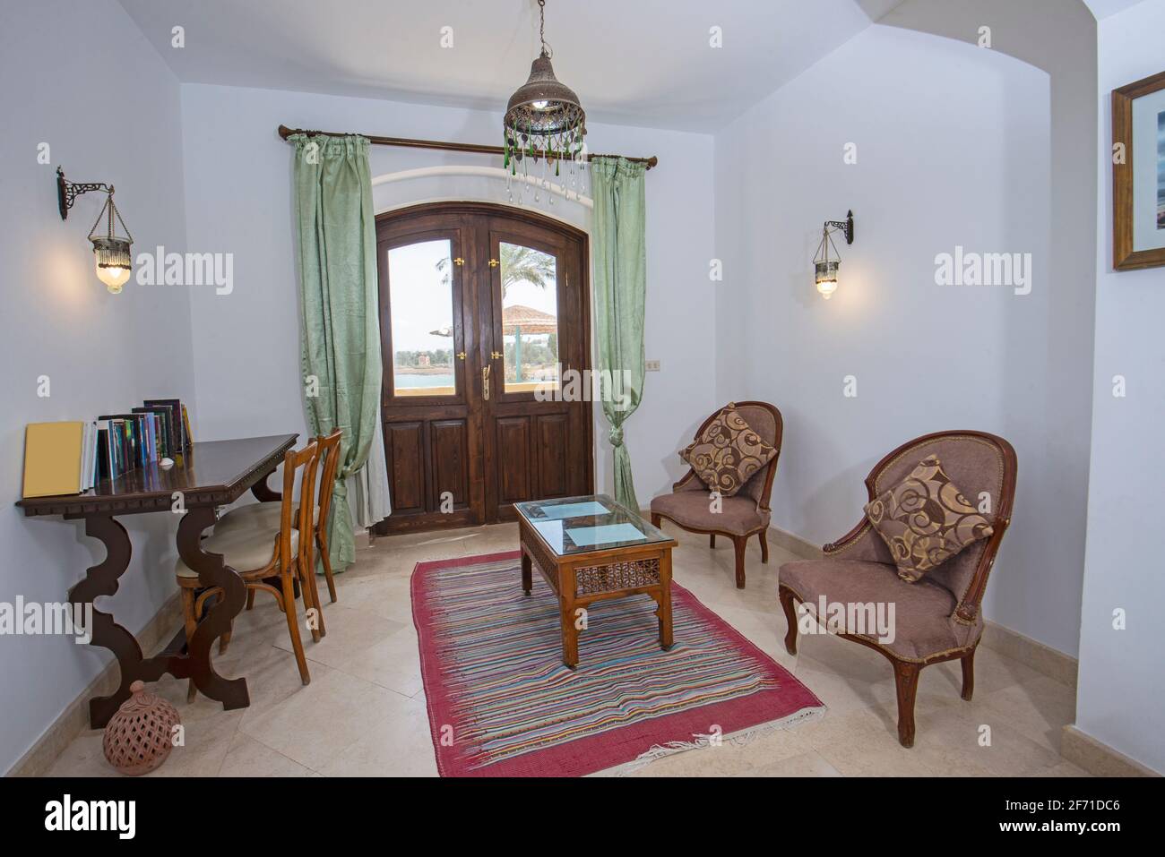 Reception living room lounge area in luxury apartment show home showing ...