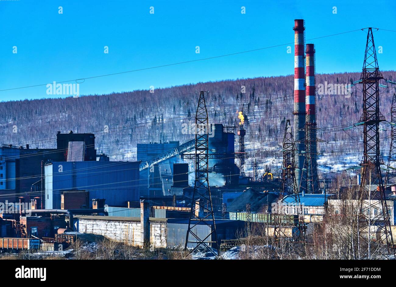 industrial landscape - the torch of a coke-chemical plant produces ...