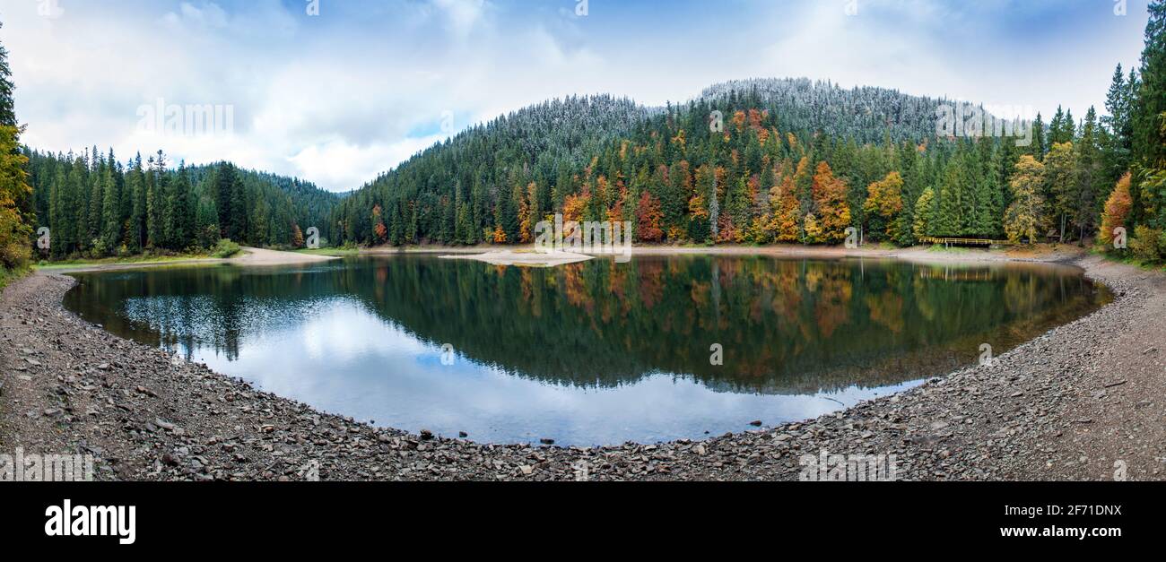 Colorful autumn in the mountains. First snow in october Stock Photo - Alamy