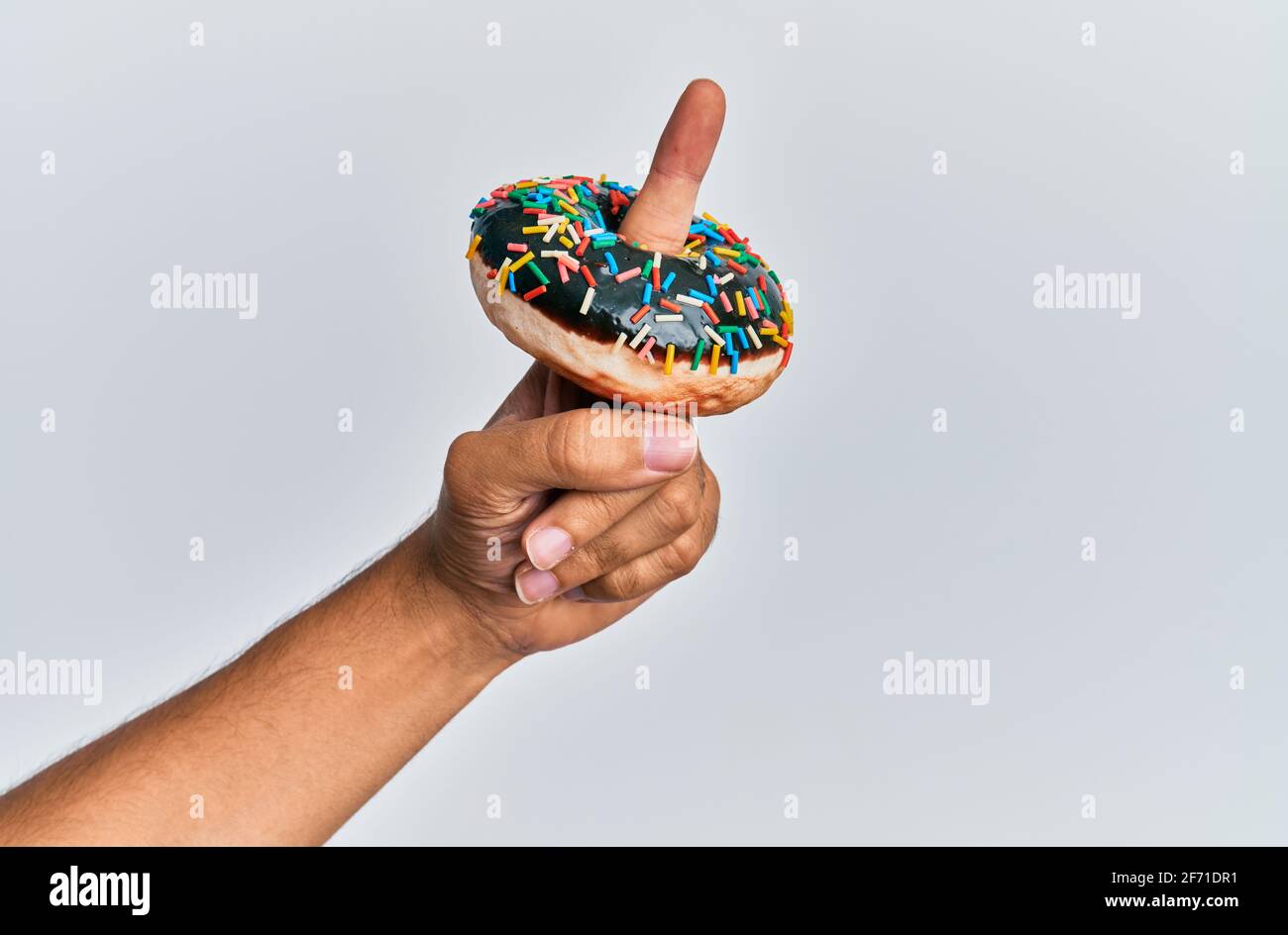 Young man holding glazed donut hi-res stock photography and images - Alamy