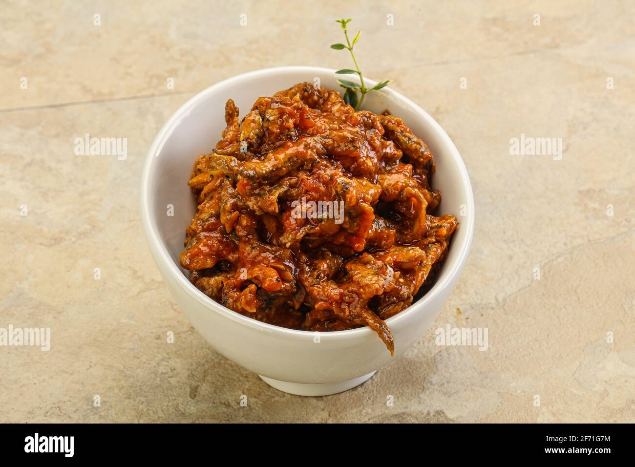 Canned anchovy snack in tomato sauce Stock Photo - Alamy