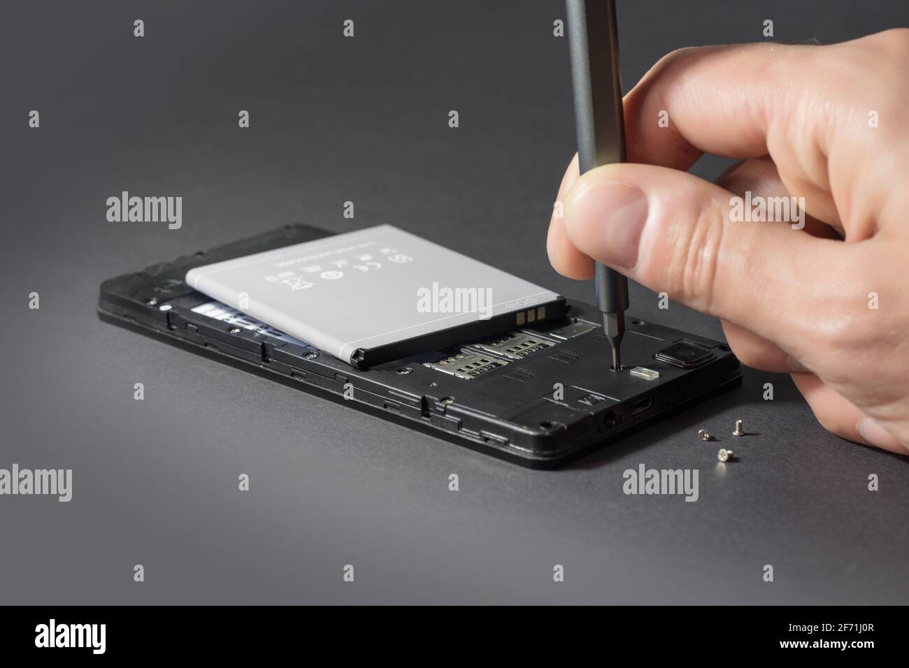 Hand repairing hi-res stock photography and images - Alamy