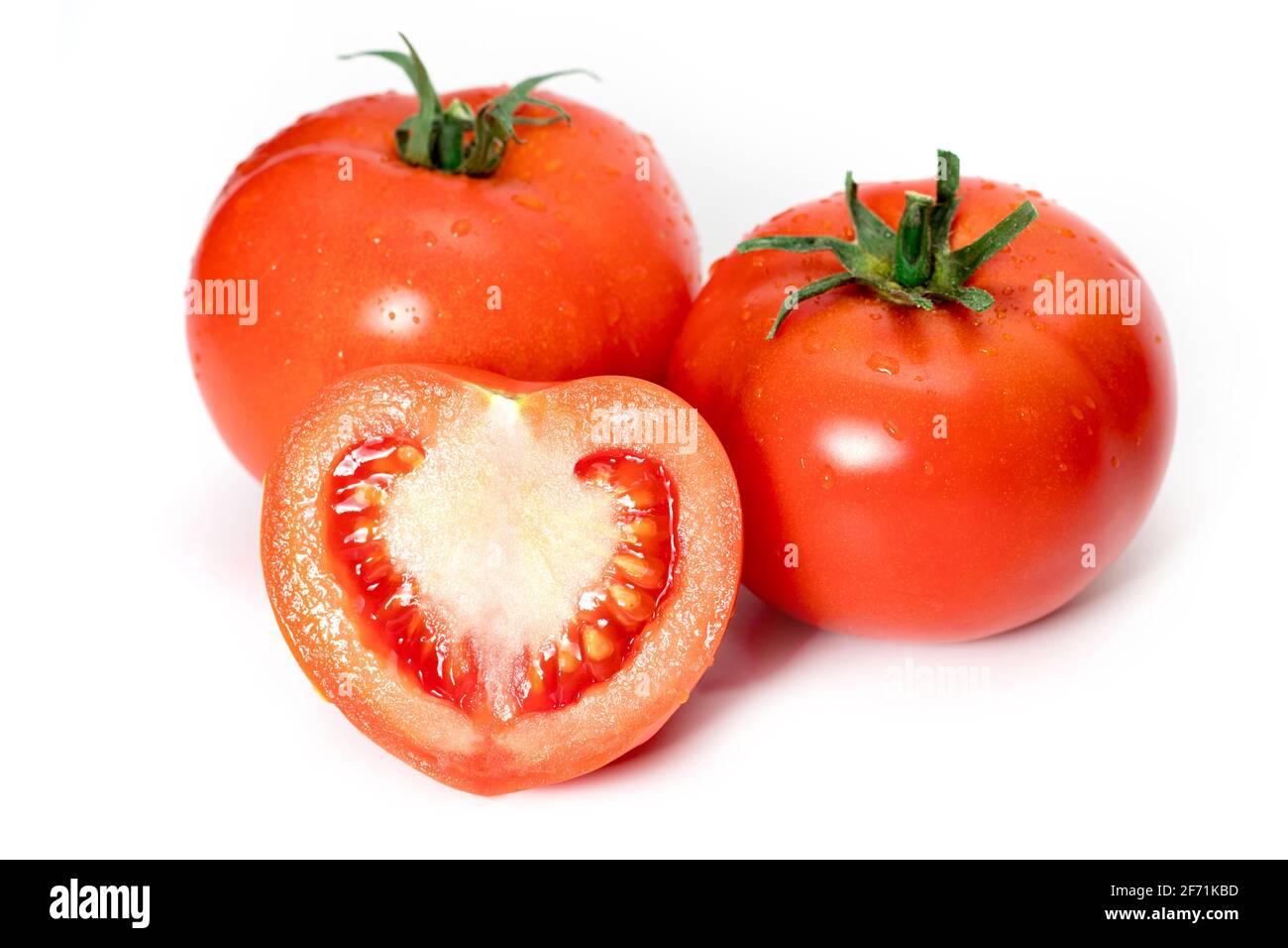 isolated tomato. Fresh cut tomatoes isolated on white background Stock ...