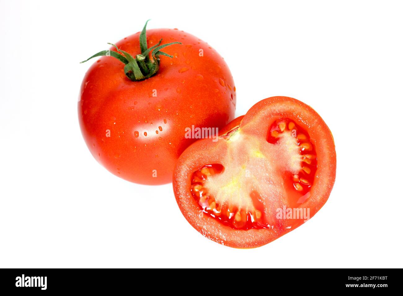 isolated tomato. Fresh cut tomatoes isolated on white background Stock ...