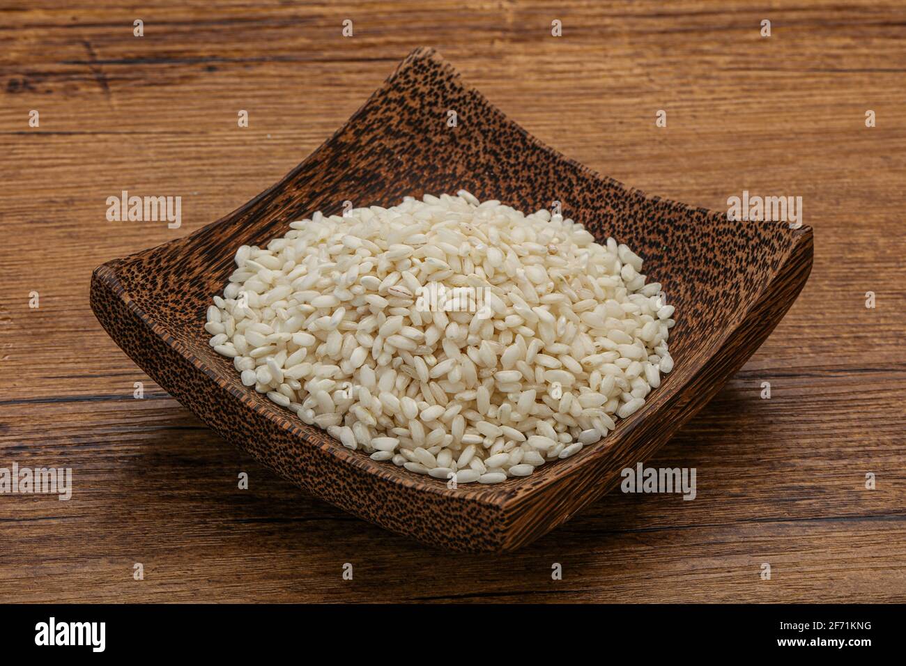 Raw Italian arborio rice for Risotto Stock Photo - Alamy