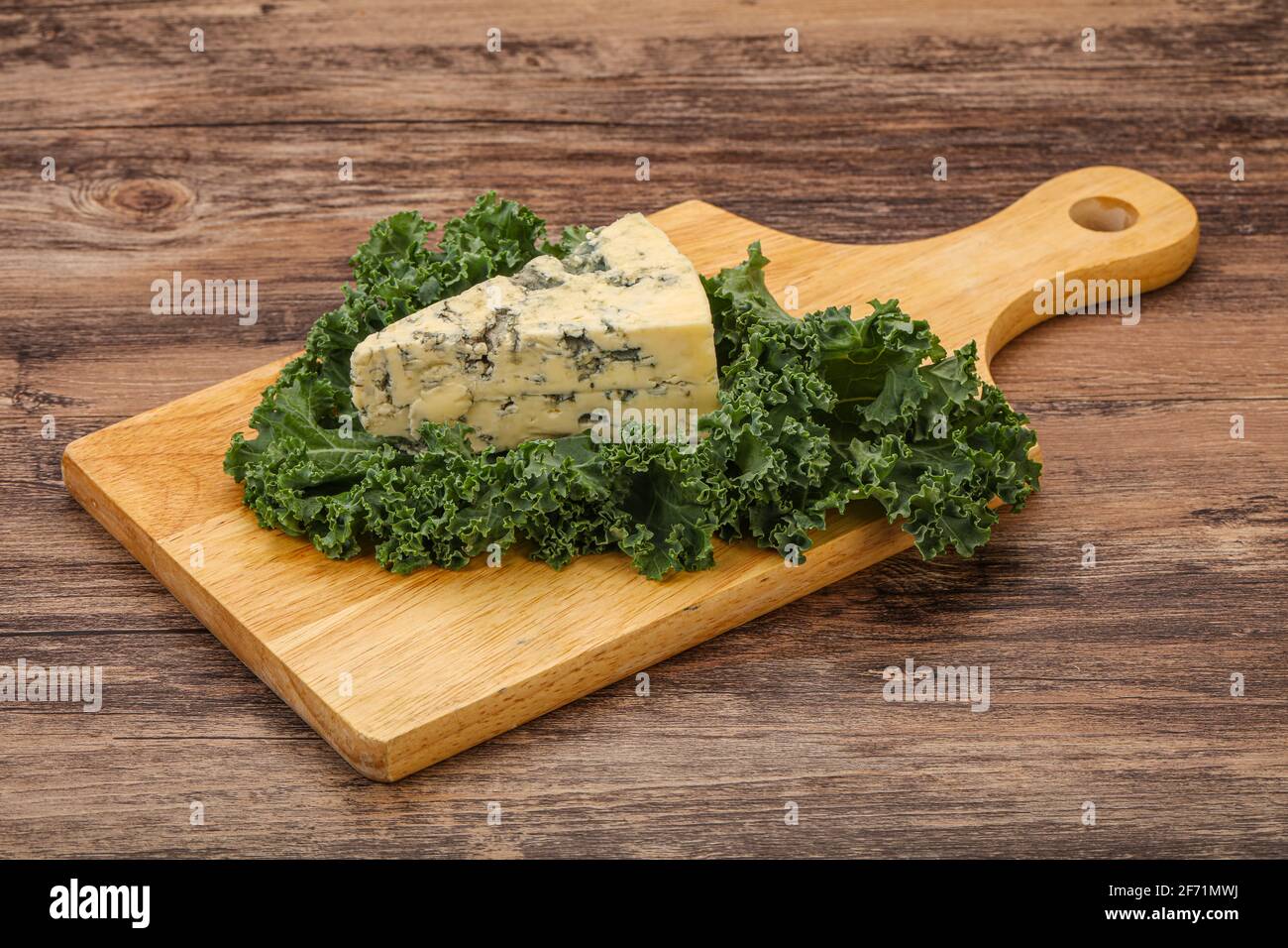 Dairy Blue cheese triangle with mold Stock Photo - Alamy