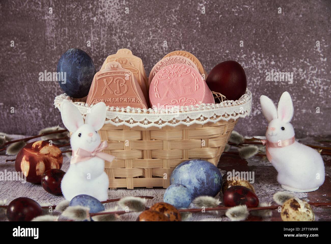 Delicate handmade Easter soap in a wicker basket Stock Photo - Alamy
