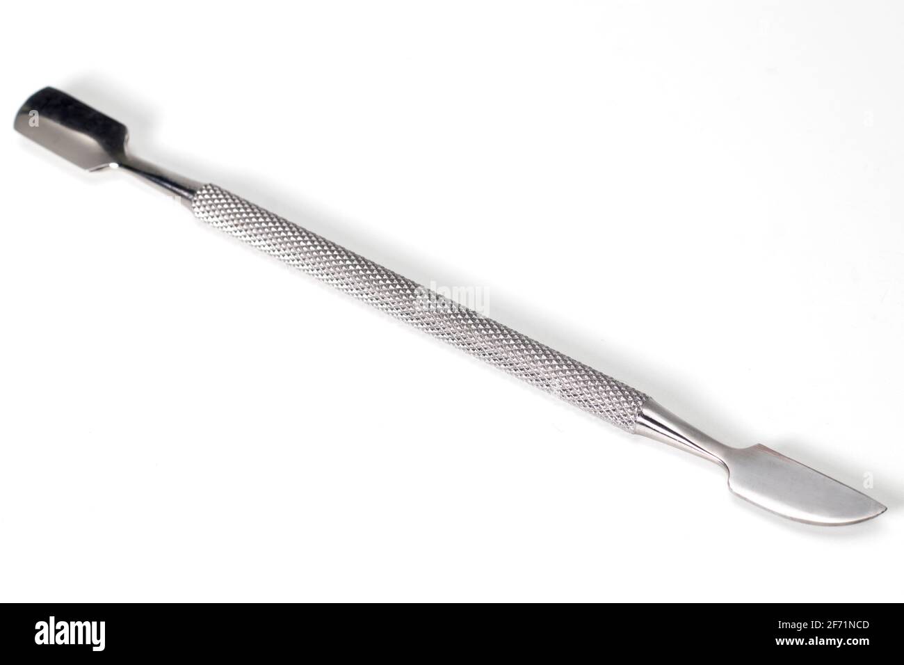 Manicure tool - scapula isolated on white background Stock Photo - Alamy