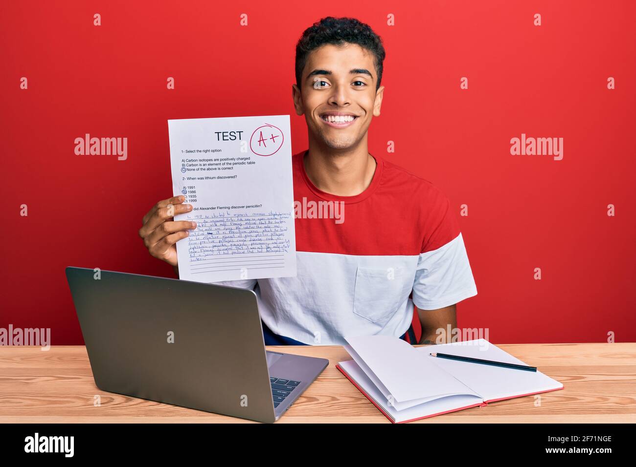 Young handsome african american man showing a passed exam looking ...