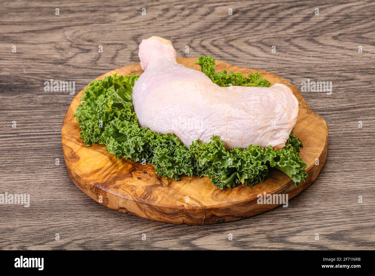 Raw uncooked chicken leg for cooking Stock Photo - Alamy
