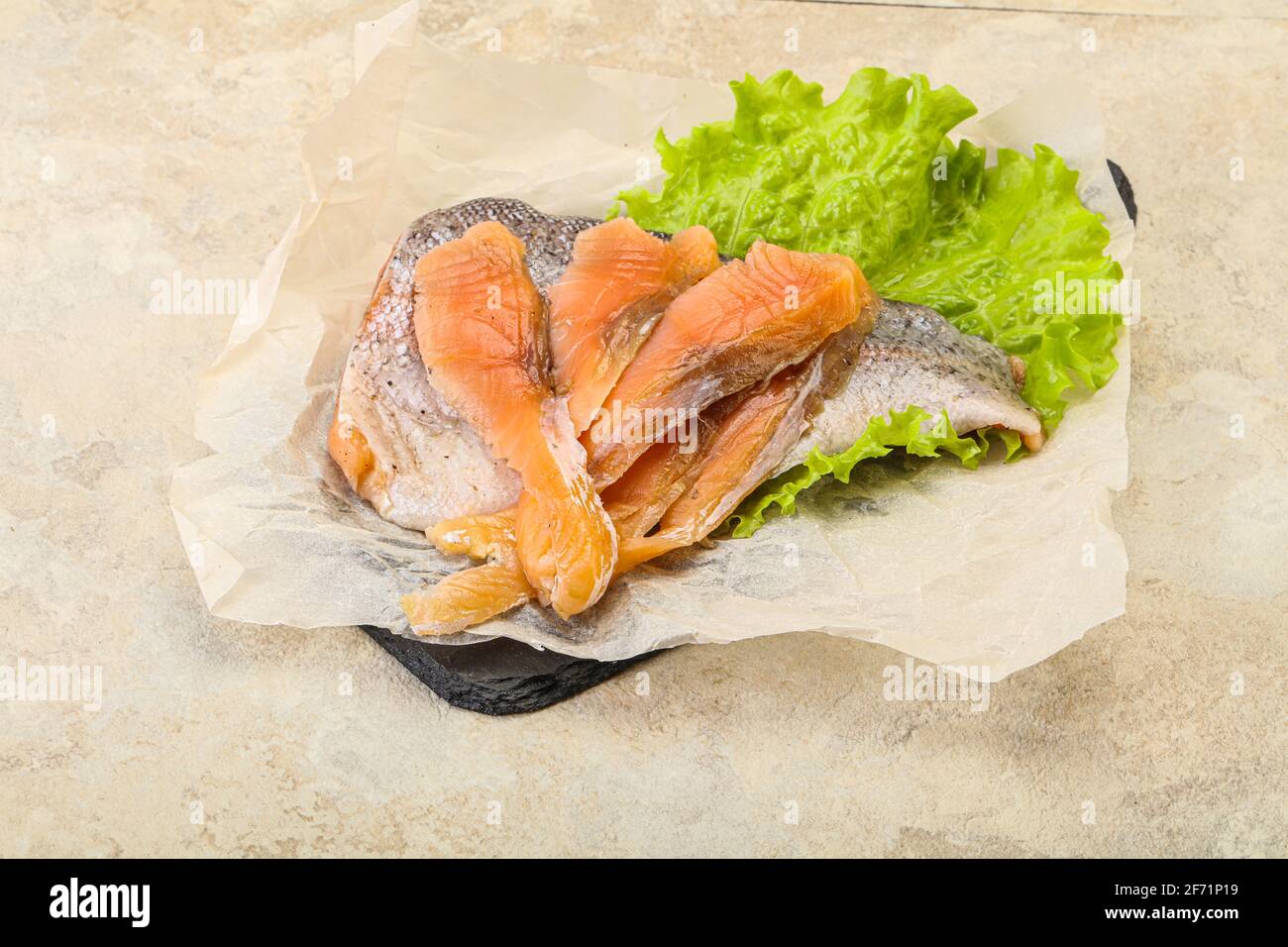 Sliced natural wild trout fillet over board Stock Photo - Alamy