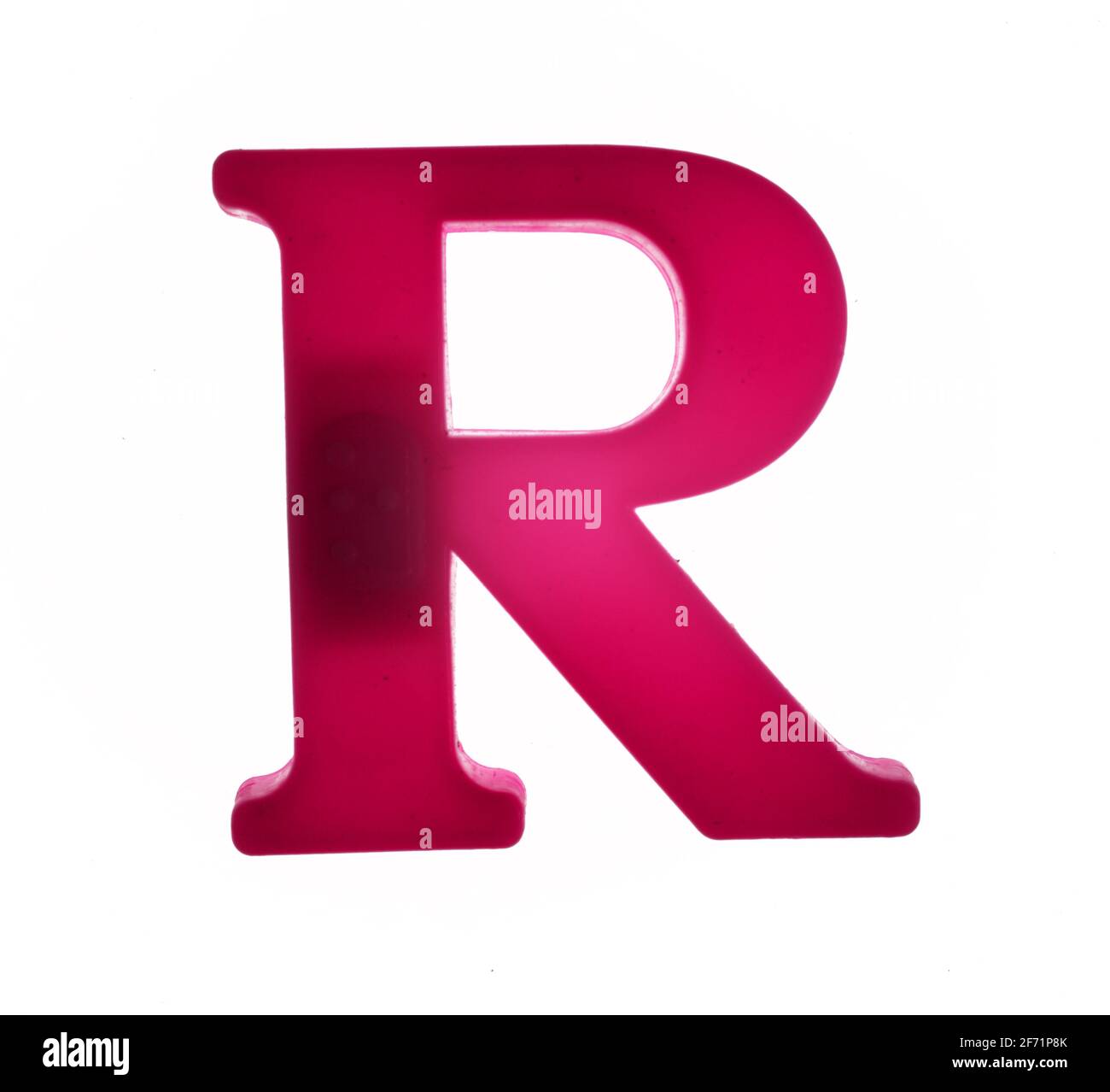 Plastic letter R on magnet isolated on white background, top view Stock ...