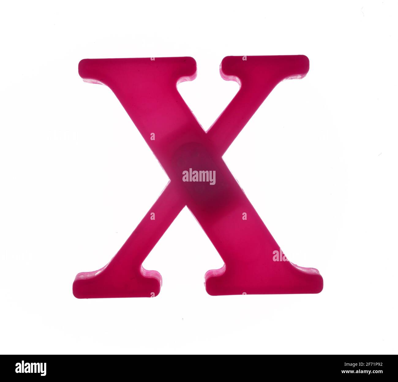 Plastic letter X on magnet isolated on white background, top view Stock ...