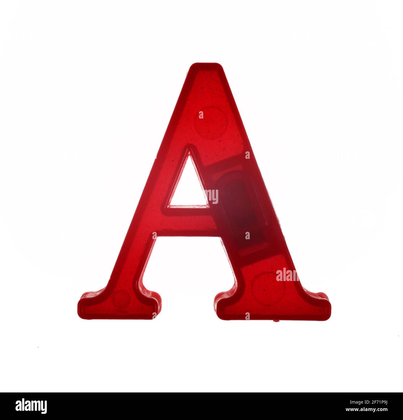 Plastic letter A on magnet isolated on white background, top view Stock ...