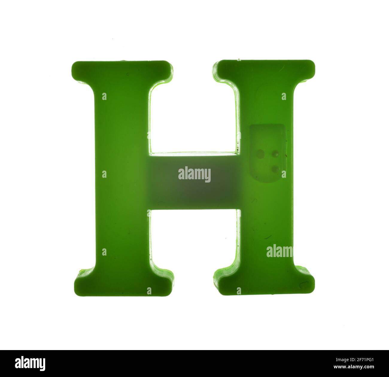 Plastic letter H on magnet isolated on white background, top view Stock ...