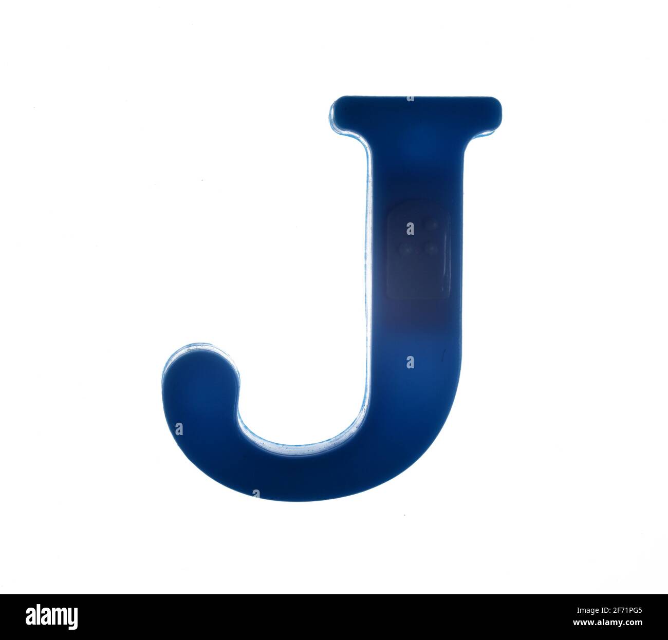 Plastic letter J on magnet isolated on white background, top view Stock ...