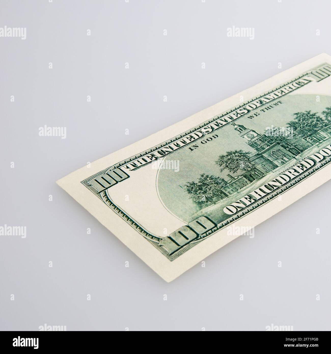 One hundred dollar cash bill on a light background. Layout, mockup ...