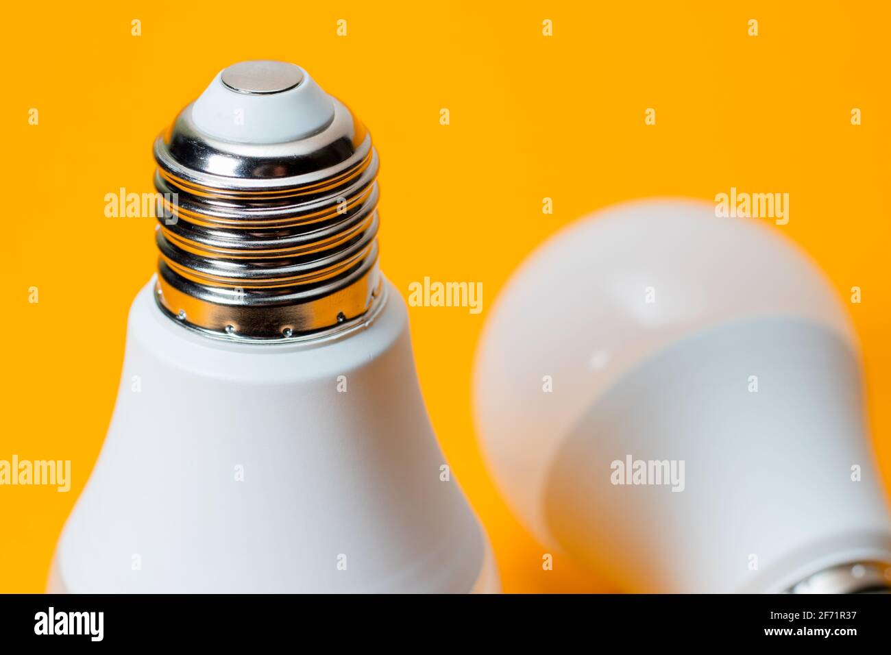 LED, New technology light bulb on yellow background, Energy super ...