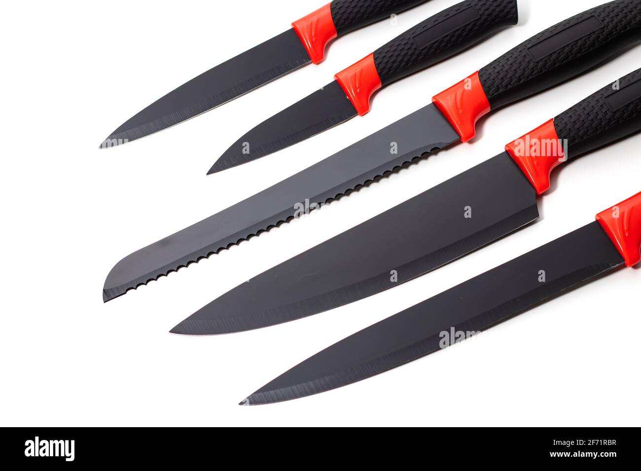 Steel kitchen knife with a black handle set isolated over the white ...