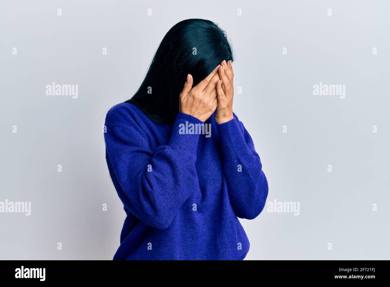 Young caucasian woman wearing casual clothes with sad expression ...