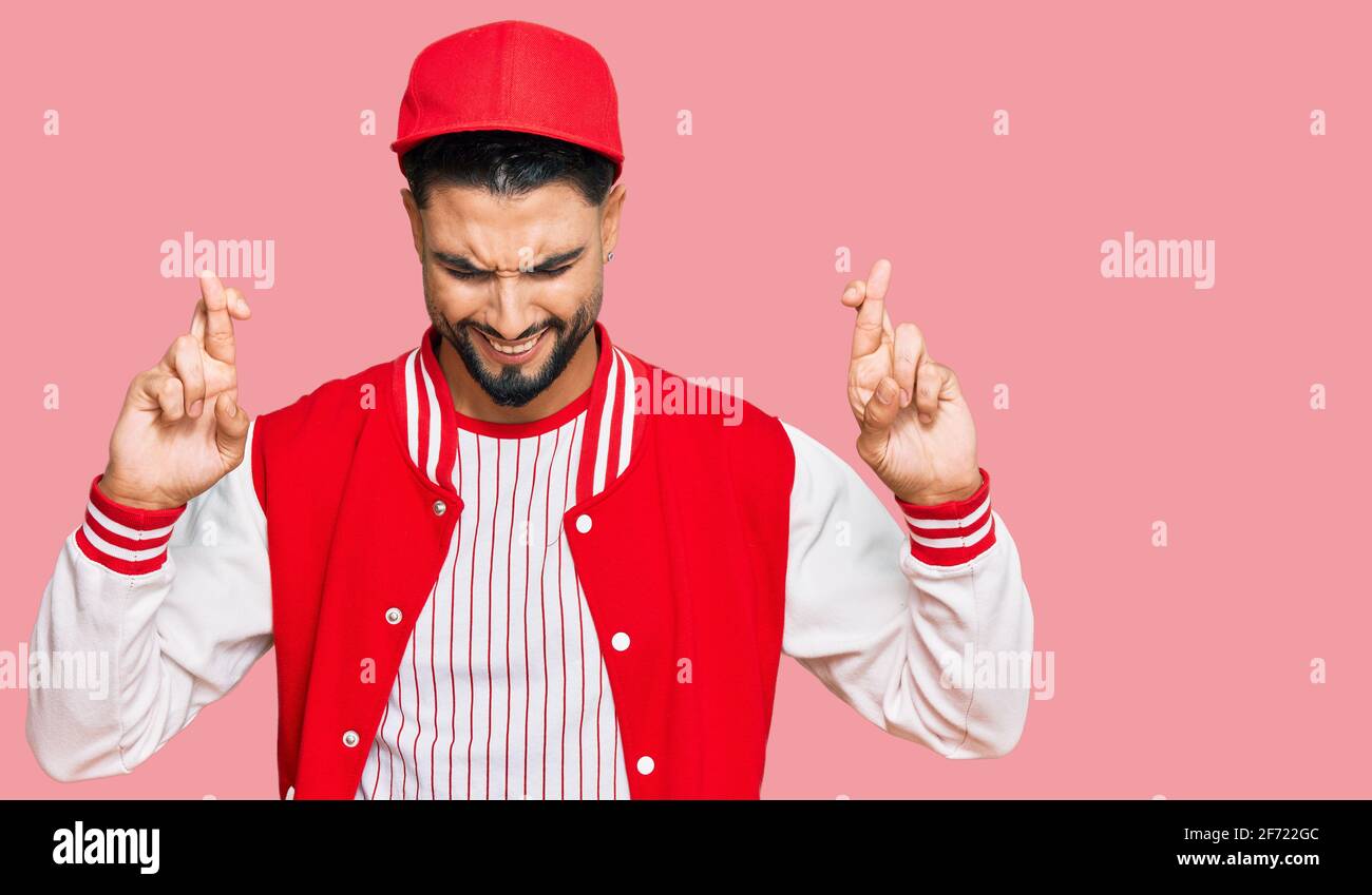 Middle finger gesture young cap hi-res stock photography and images - Alamy