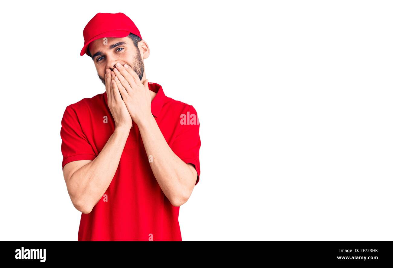 Young Handsome Man With Beard Wearing Delivery Uniform Laughing And