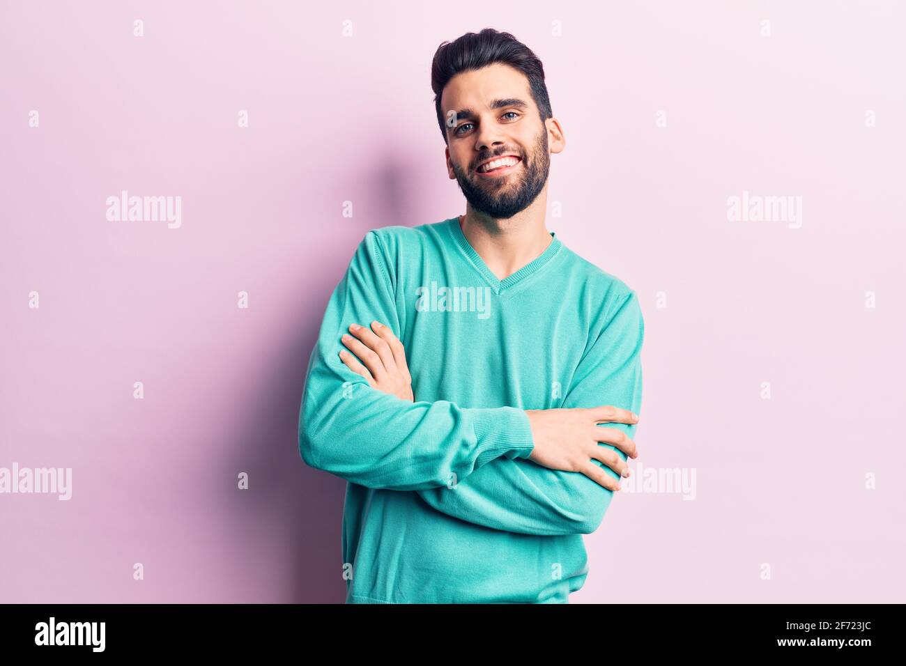 Young handsome man with beard wearing casual sweater happy face smiling ...