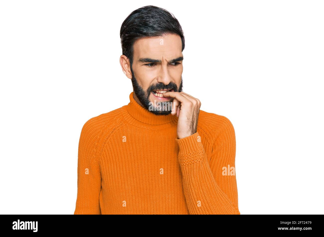 Young hispanic man wearing casual clothes looking stressed and nervous ...