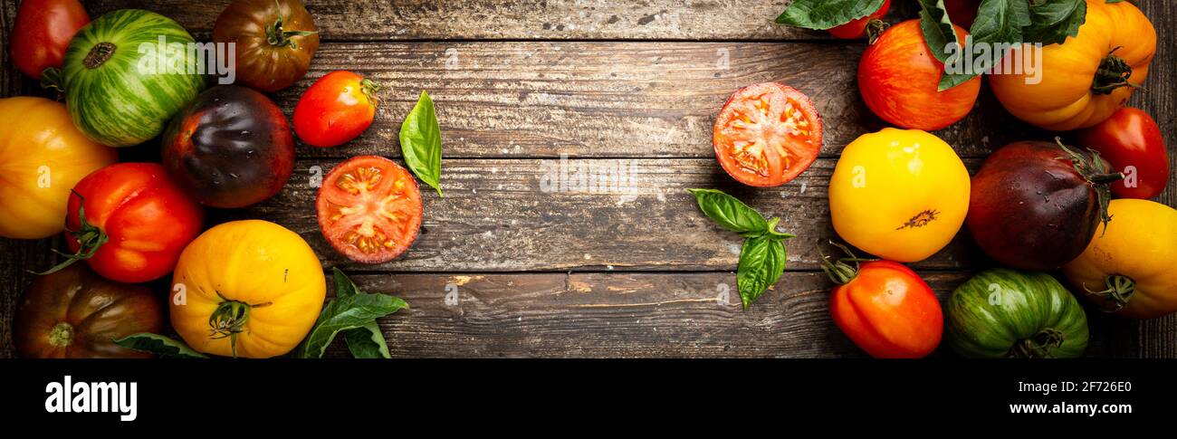 Mixed tomatoes top view. Composition with variety of colorful fresh ...