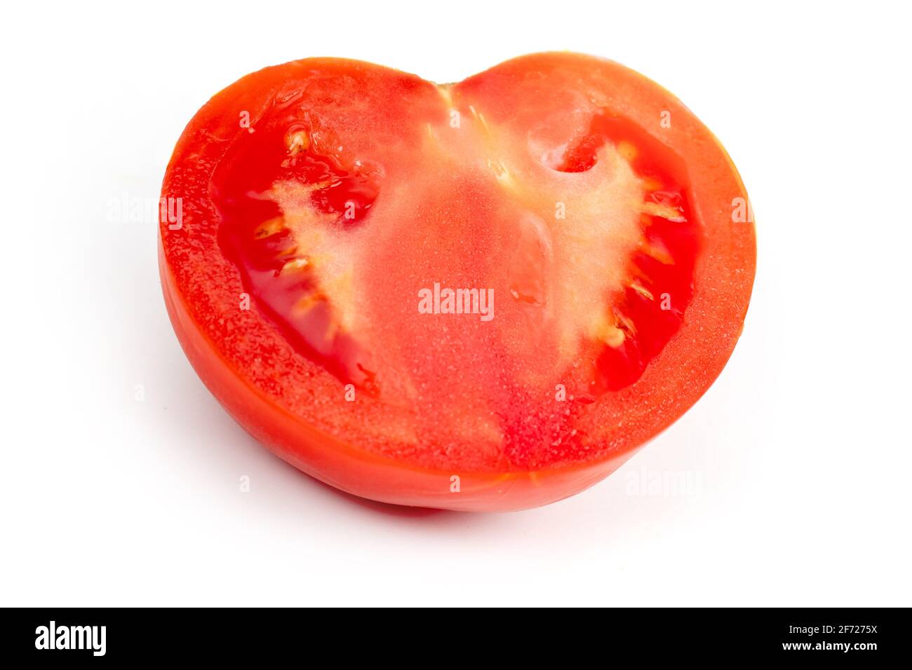 Tomato. Fresh slice of vegetable isolated on white Stock Photo - Alamy