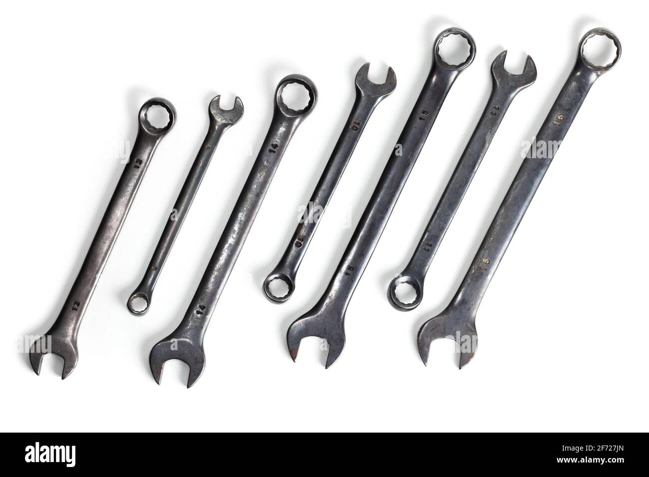 Spanner Set Isolated. dark coloured spanners lying side by side in ...