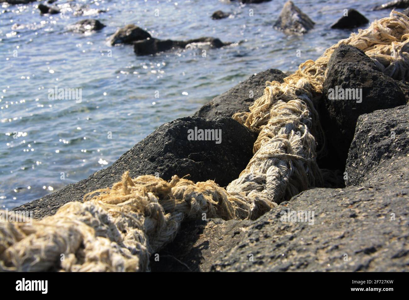 Long rope on the beach hi-res stock photography and images - Alamy