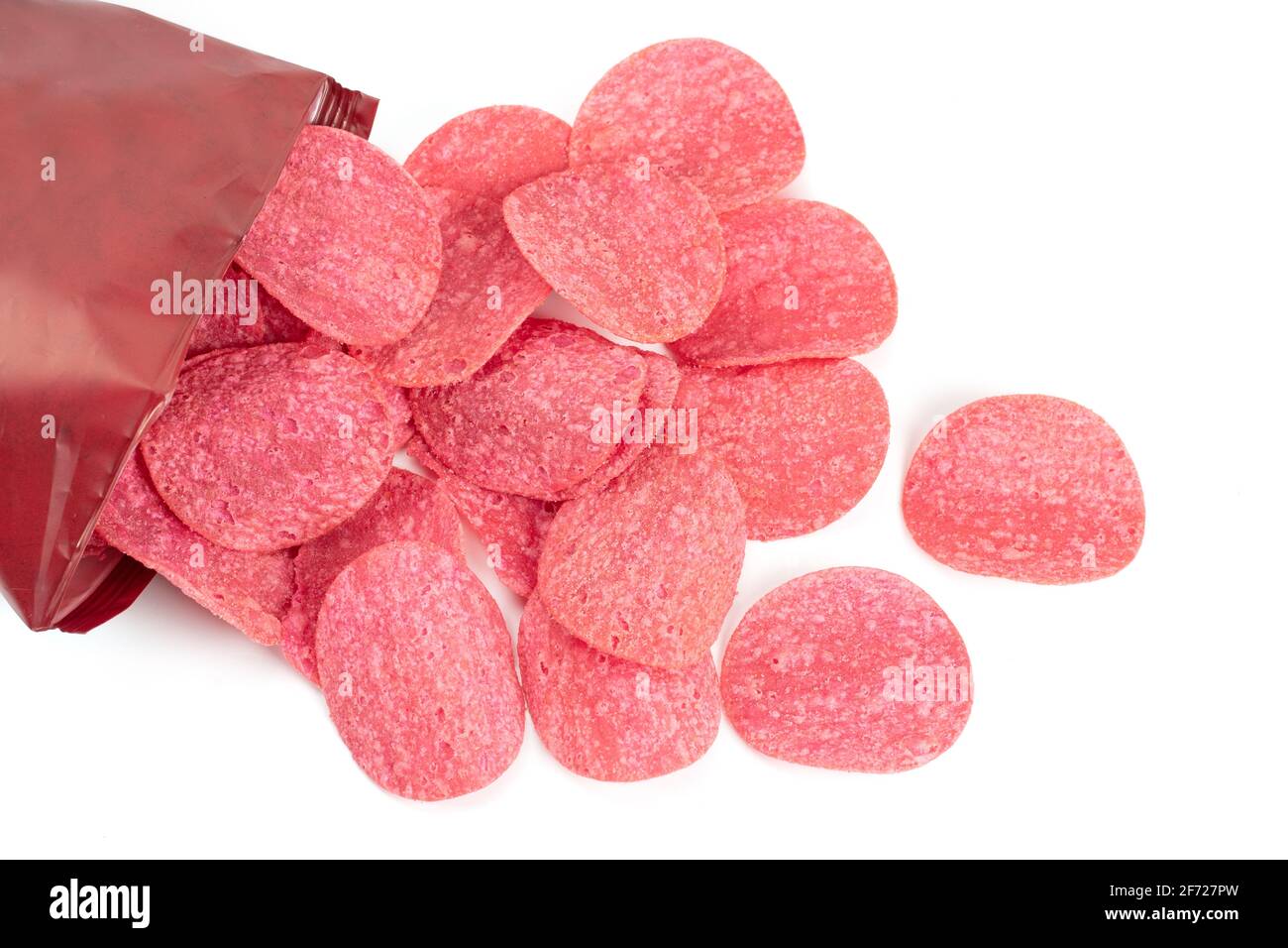 Pink potato chips isolated on white background Stock Photo - Alamy