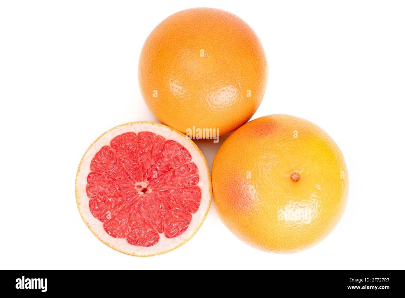 Half and slice of grapefruit isolated on white Stock Photo - Alamy