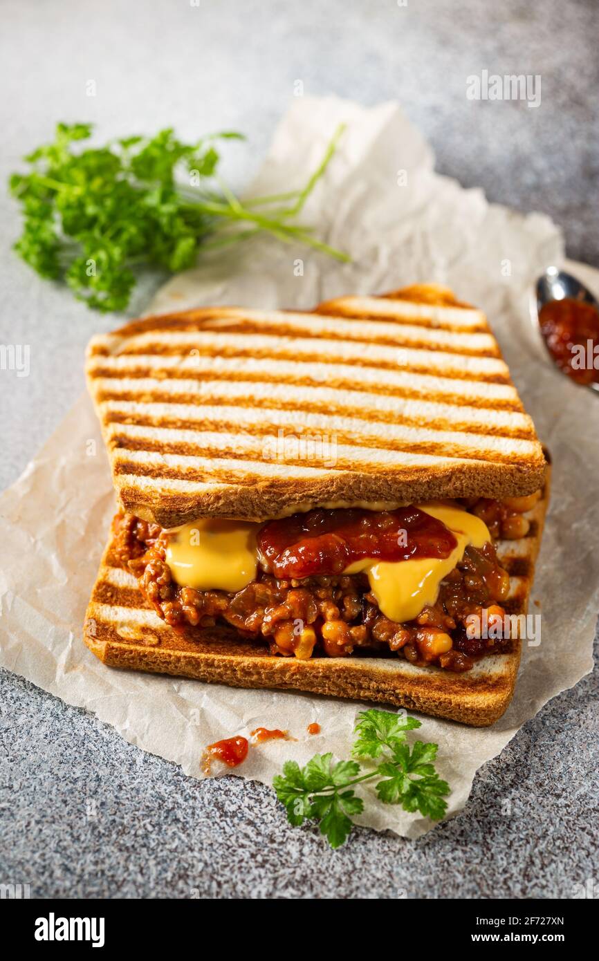 Close up view of tasty sloppy joe sandwich with ground meat, sauce and ...
