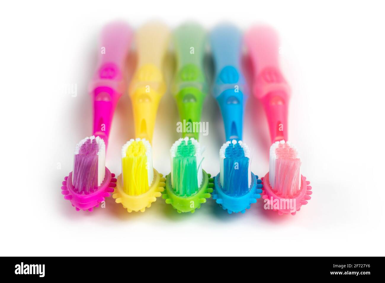 Set colorful toothbrushes on white background Stock Photo - Alamy
