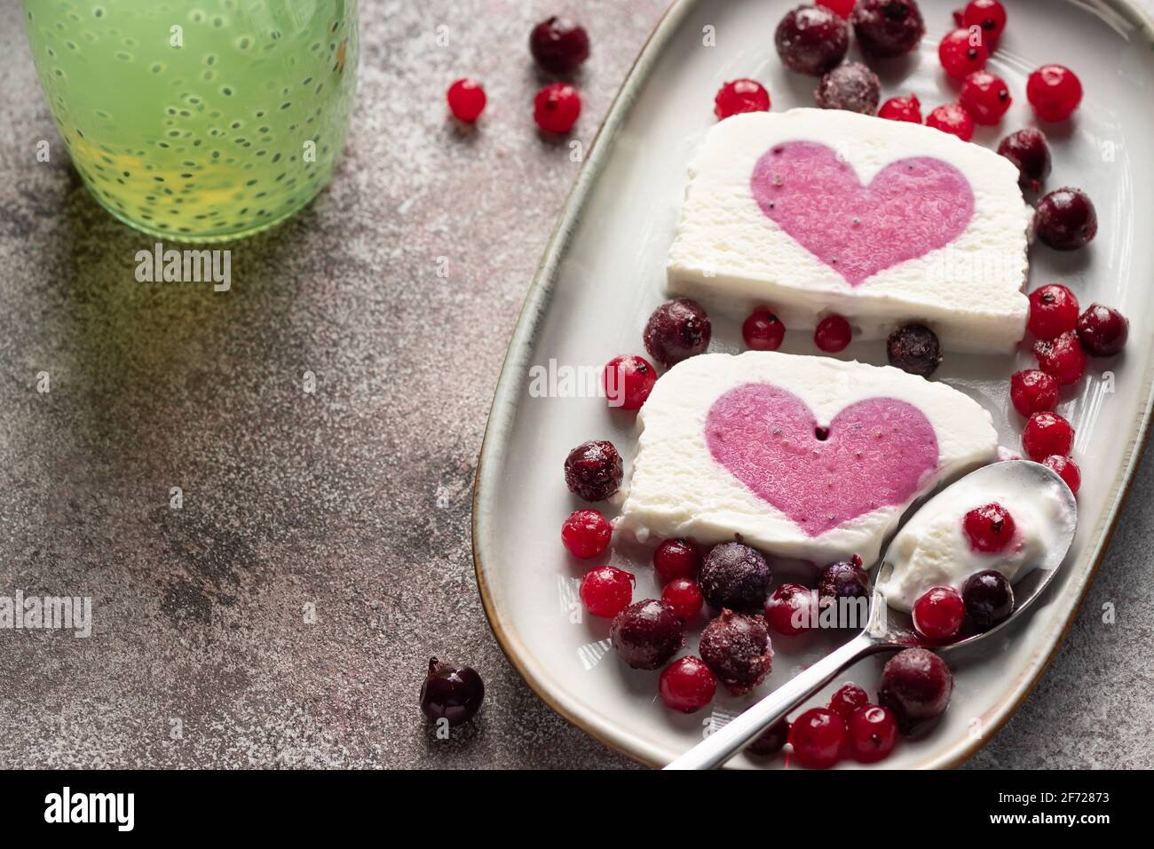 delicious ice cream with berry heart filling Stock Photo - Alamy