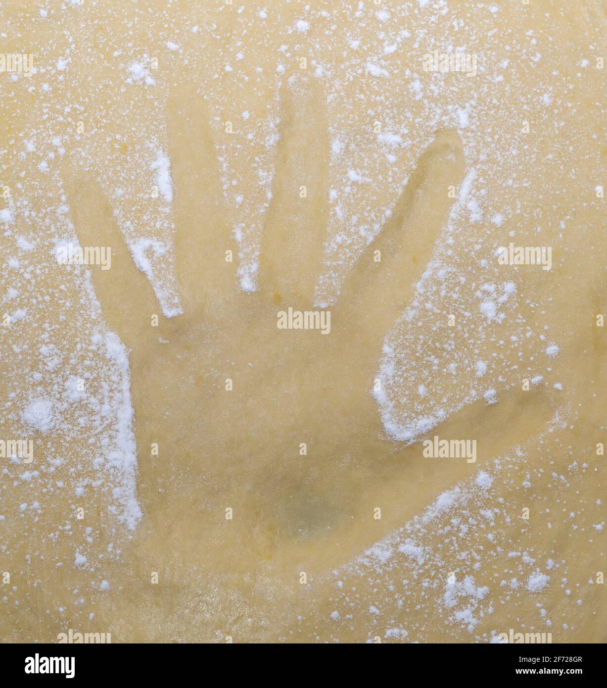 Close up of a handprint on a dough with flour Stock Photo - Alamy