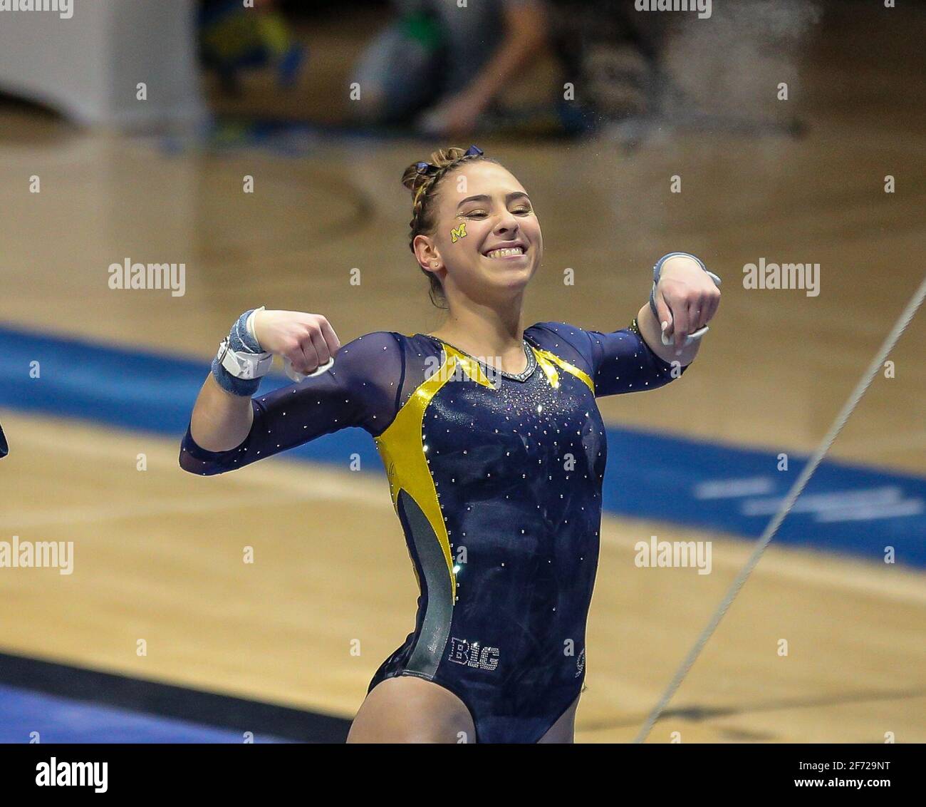 April 3, 2021: Michigan's Natalie Wojcik celebrates her beam routine ...