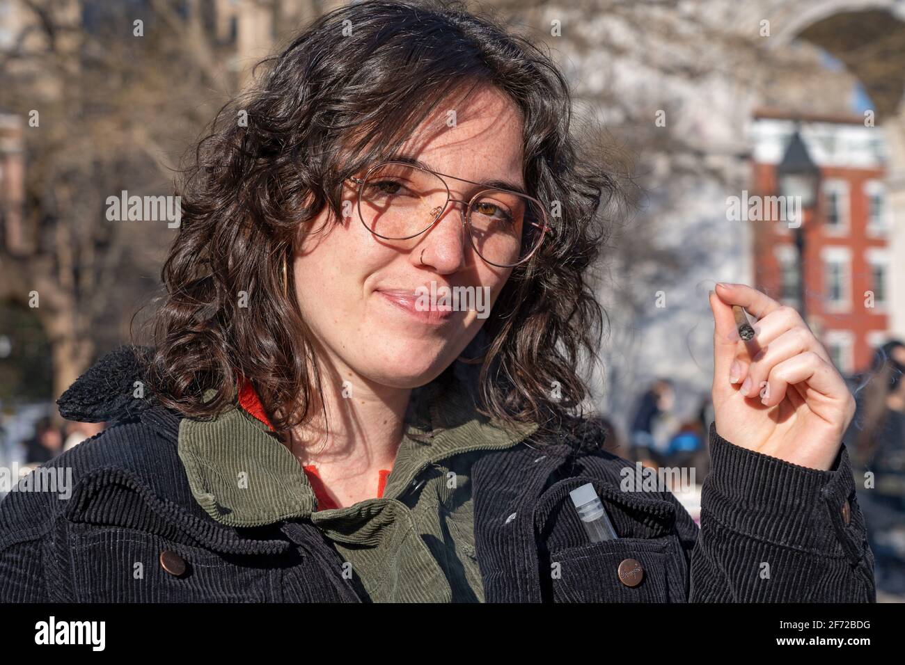 NEW YORK, NY – APRIL 3: A New Yorker smokes a joint in Washington ...