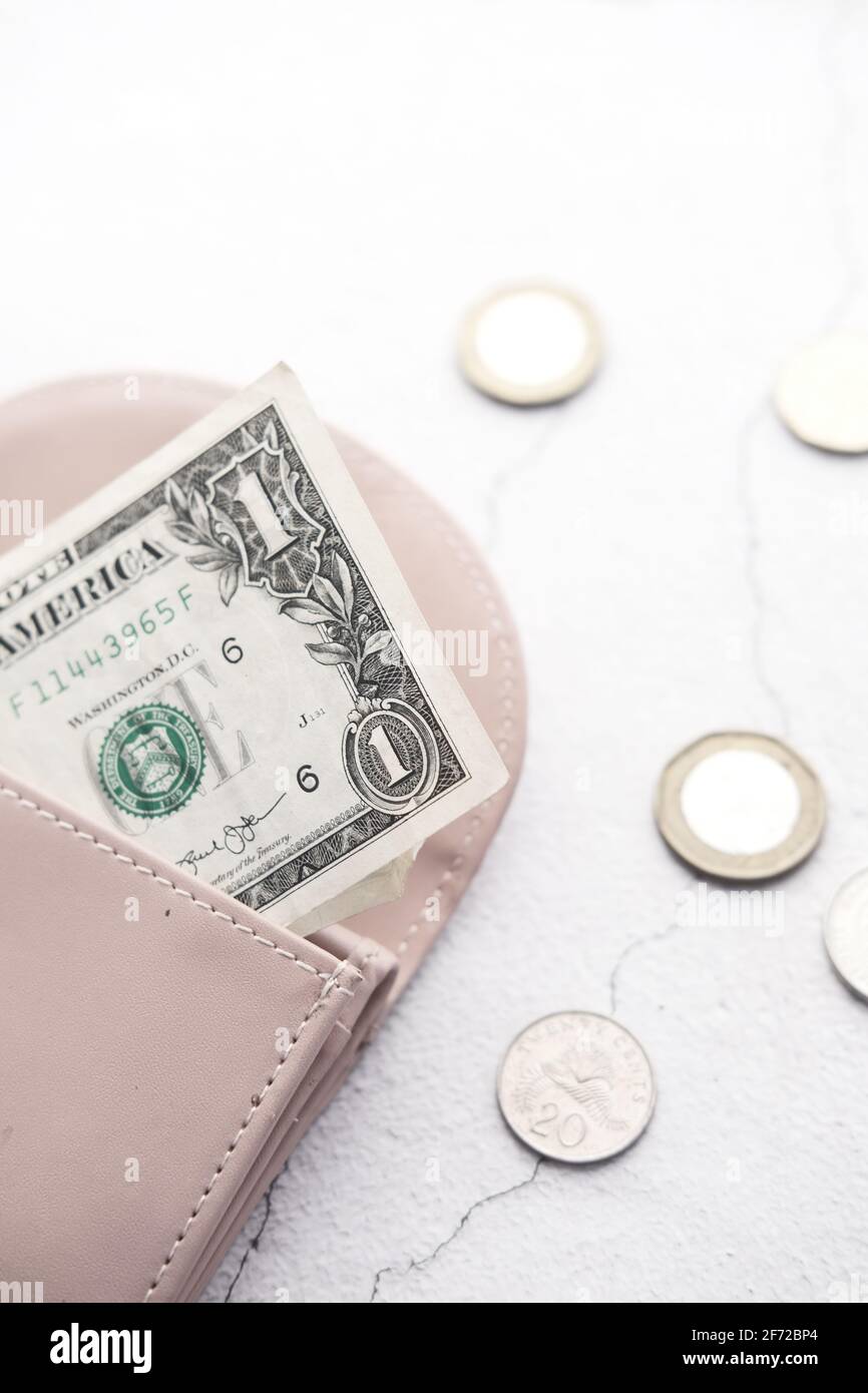 Us dollar cash in leather on white background Stock Photo - Alamy