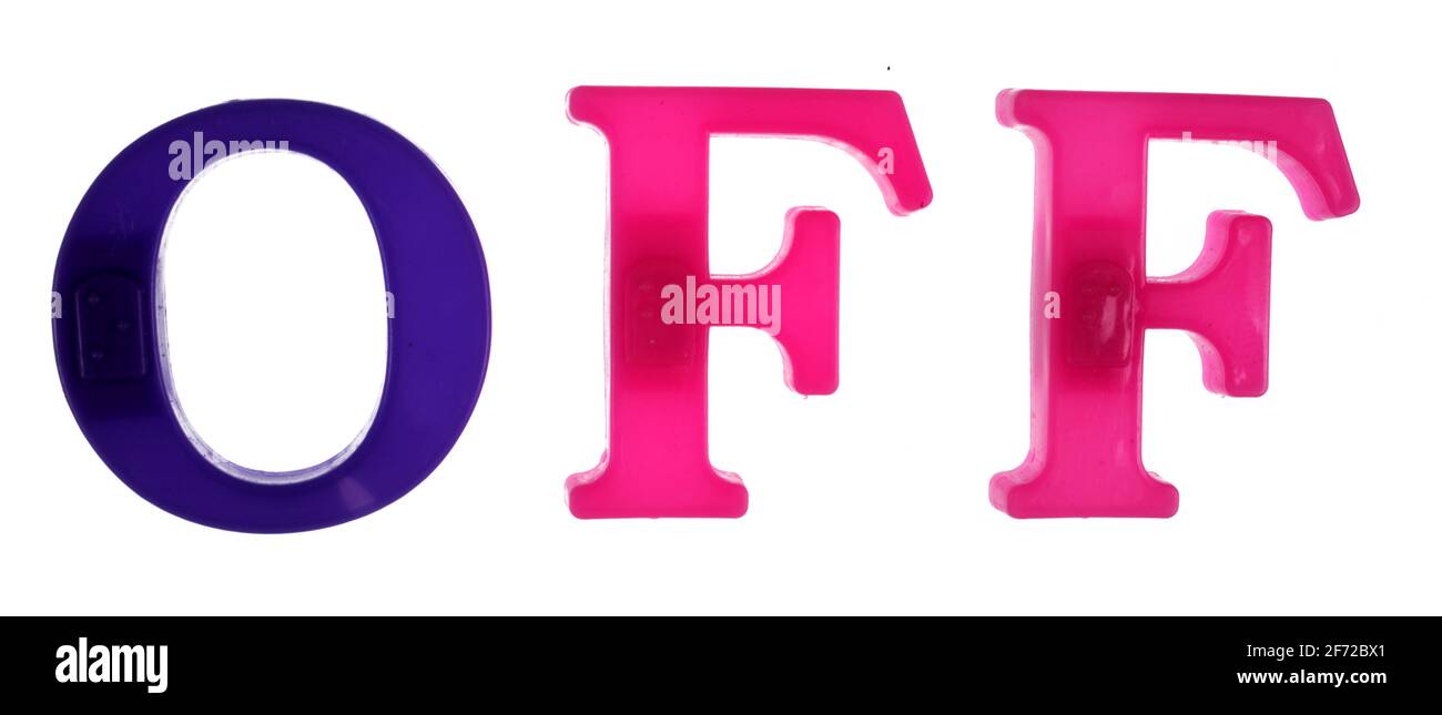 Off word lined with plastic multicolored letters on white background ...