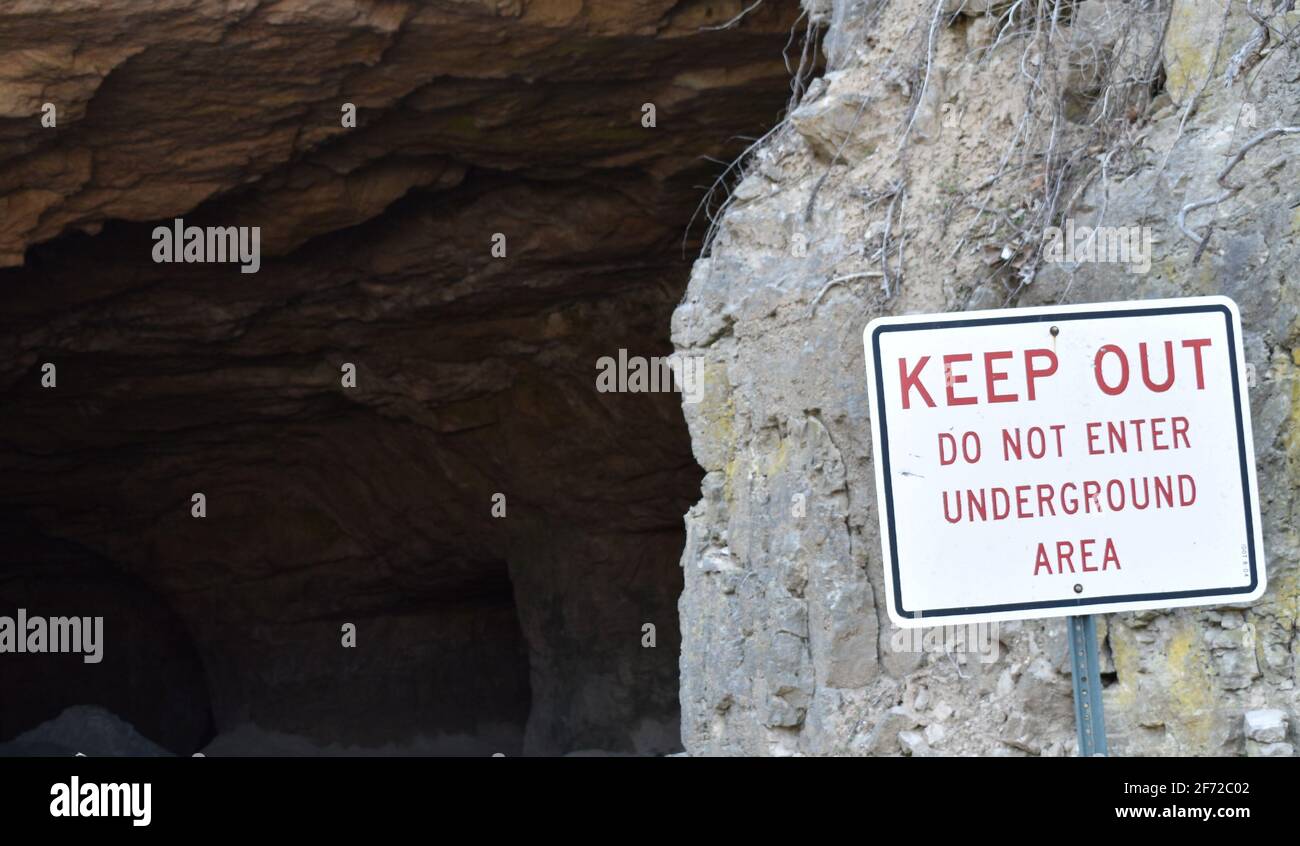 Keep Out sign by abandoned quarry Stock Photo - Alamy