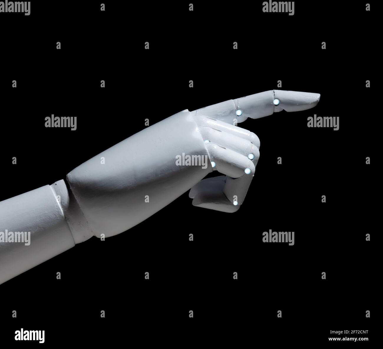White robot hand finger point isolated on black background Stock Photo ...