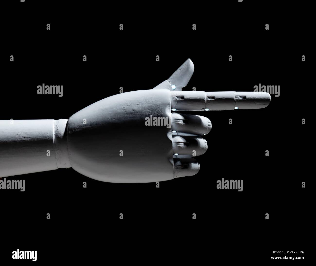 White robot hand finger point isolated on black background Stock Photo ...