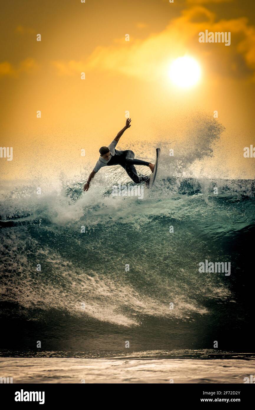 Boy surfing teen wetsuit hi-res stock photography and images - Alamy