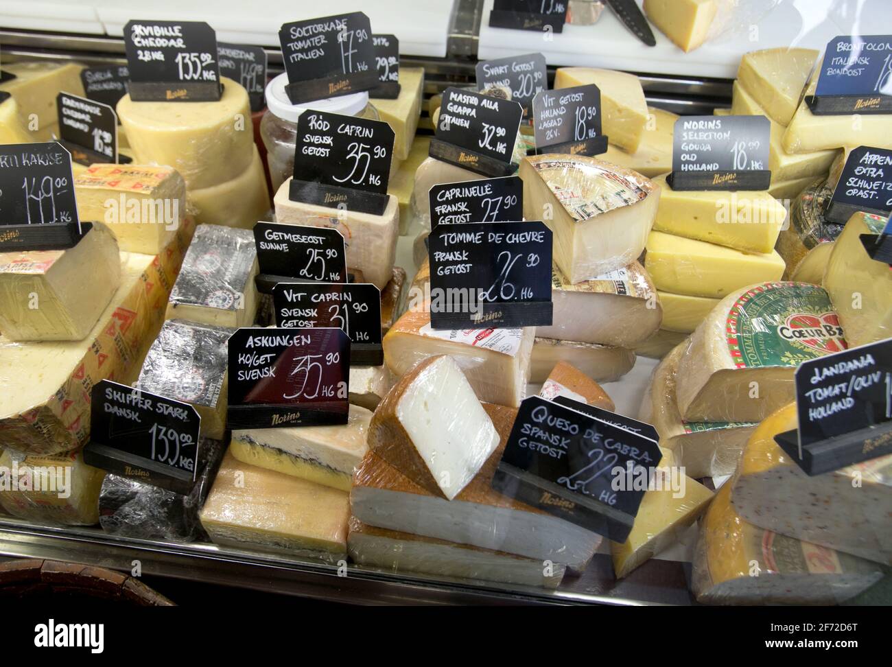 Different cheeses in a cheese shop Stock Photo - Alamy