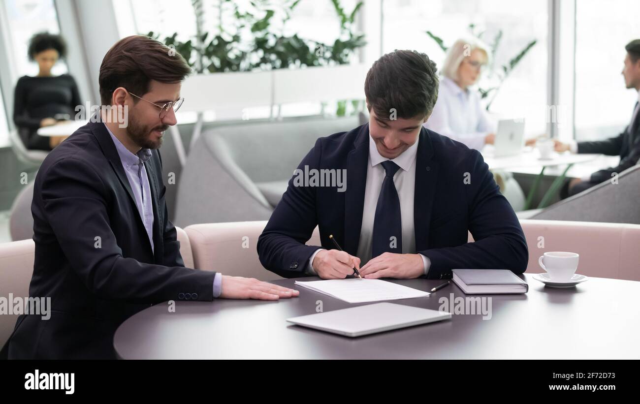 Businessman sign hi-res stock photography and images - Alamy