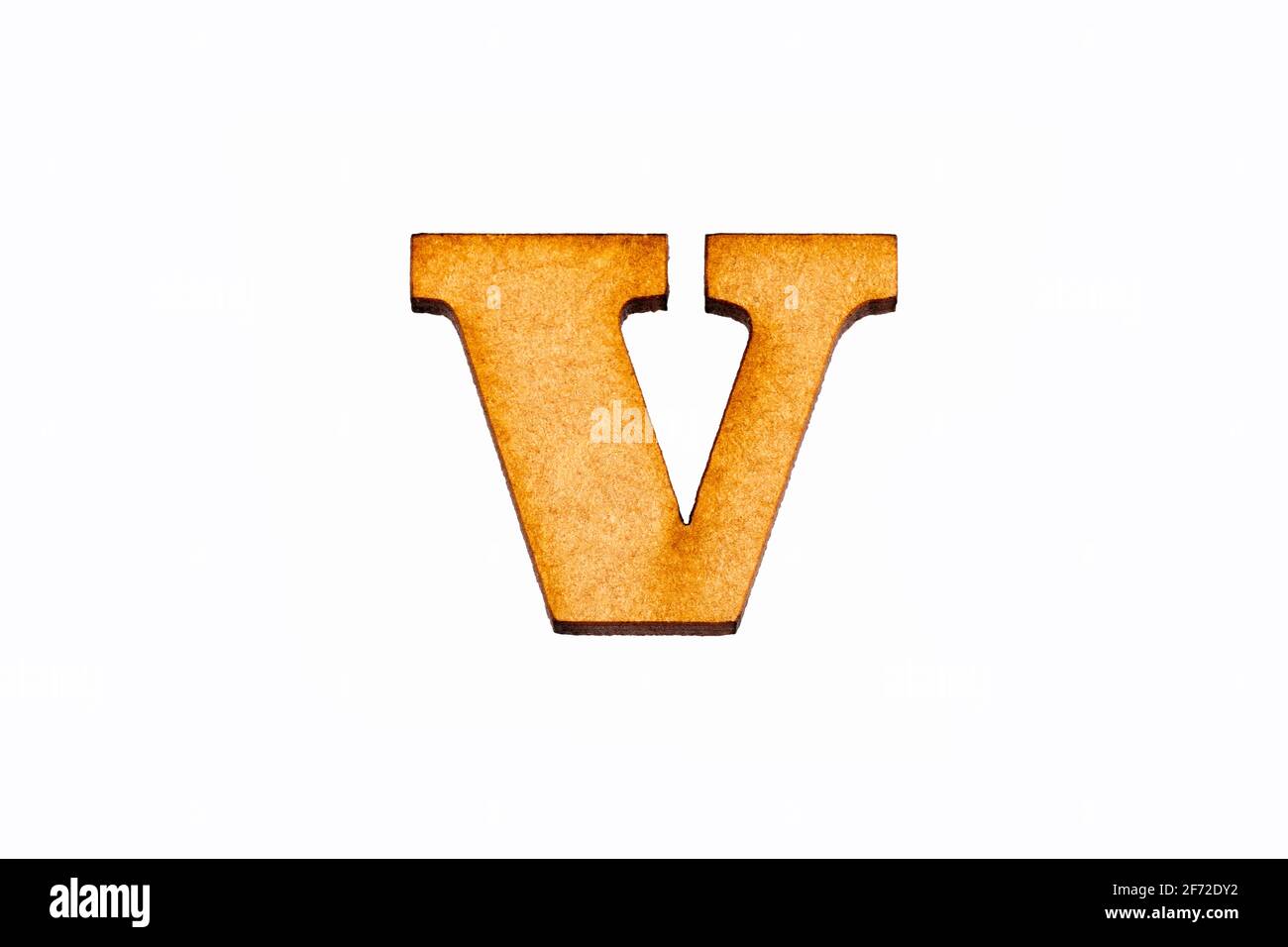 Lowercase letter v - Piece in wood Stock Photo - Alamy